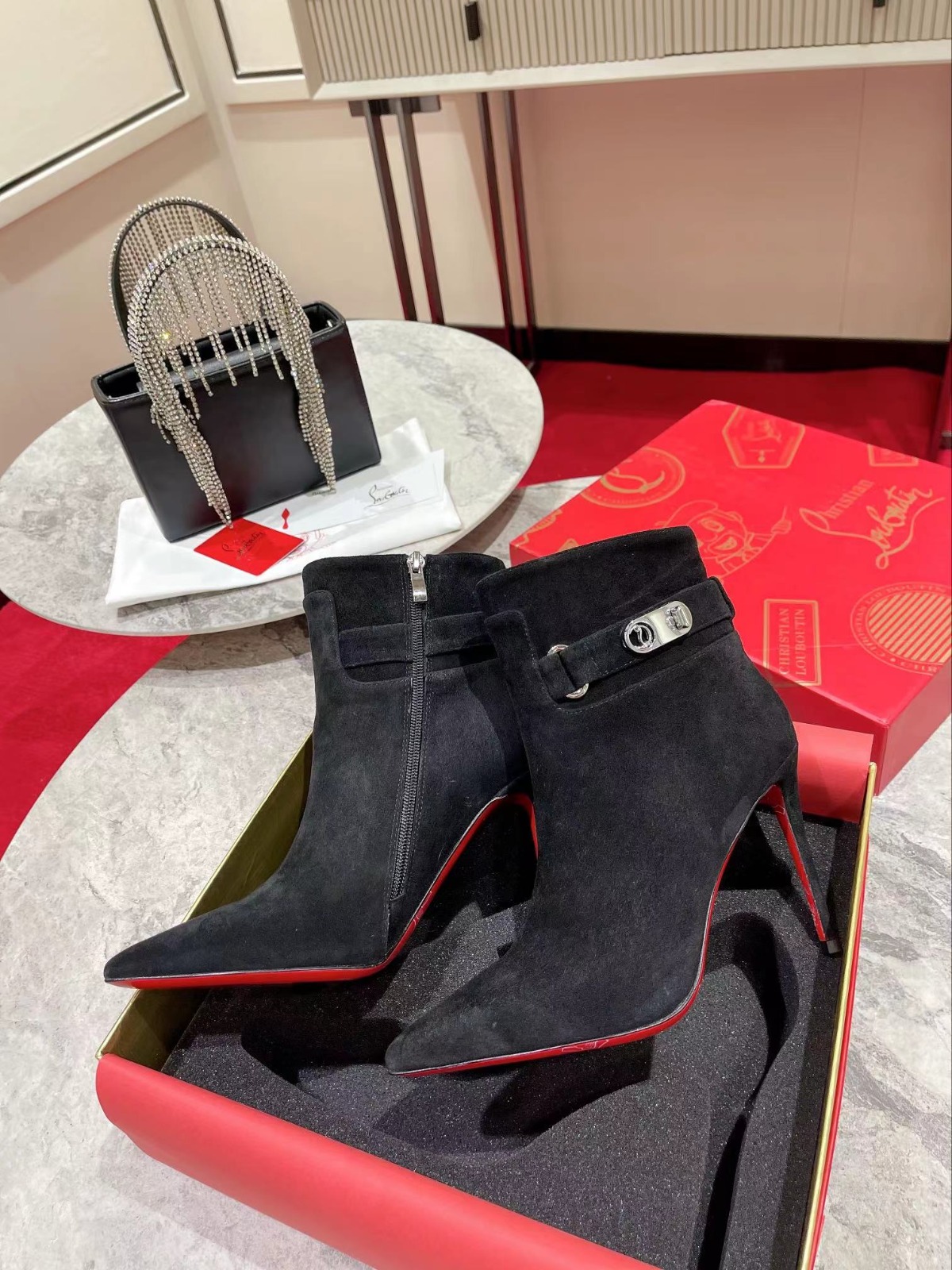 Christian Louboutin Lock Booty - GlamGems Boutique